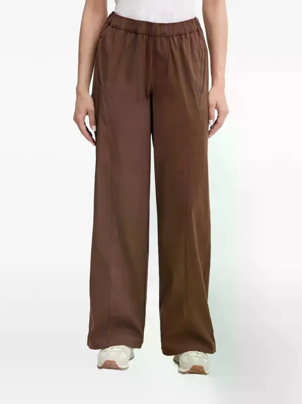 Under Armour Unstoppable Woven Elasticated-waistband Logo-patch Track Pants - Brown