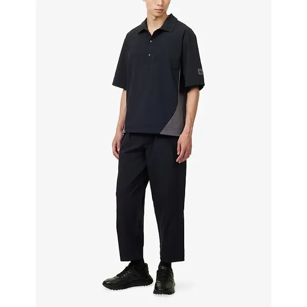 MANORS Greenskeepers Tapered-leg Stretch-woven Trousers - Black