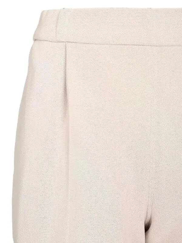 CFCL Tapered-leg Pintuck-knit Trousers