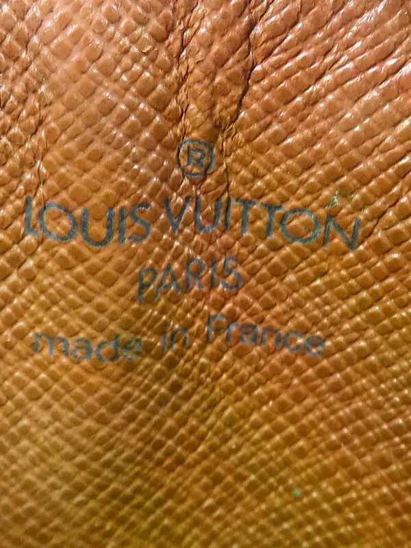 LOUIS VUITTON Monogram-embossed Coin Case