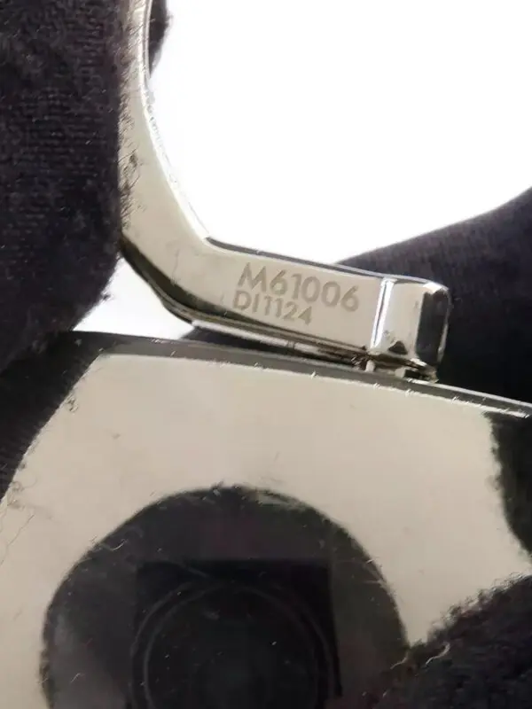 LOUIS VUITTON Gaston V Twist Key Ring
