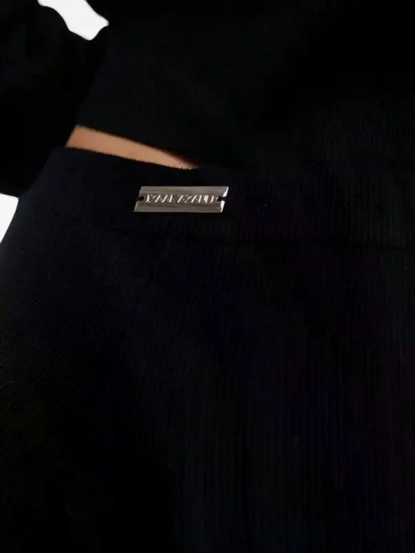 IZAAK AZANEI Ribbed Knit Flared Trousers