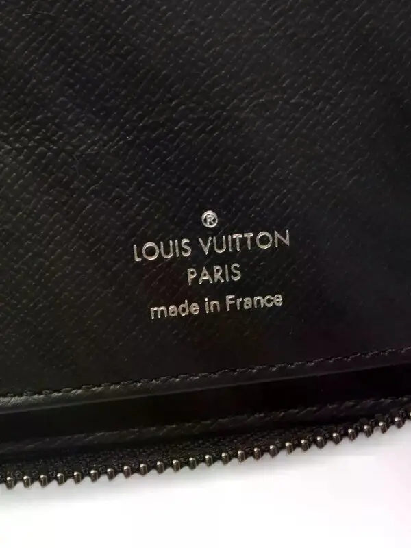 LOUIS VUITTON Eclipse Zippy Monogram Wallet