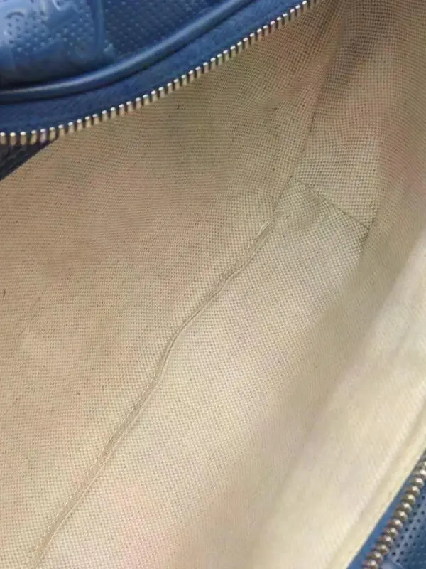 Gucci Gg Embossed Leather Belt Bag