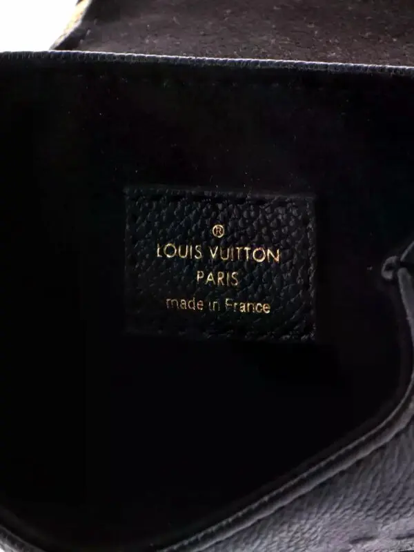 LOUIS VUITTON Tiny Monogram Empreinte Giant Backpack