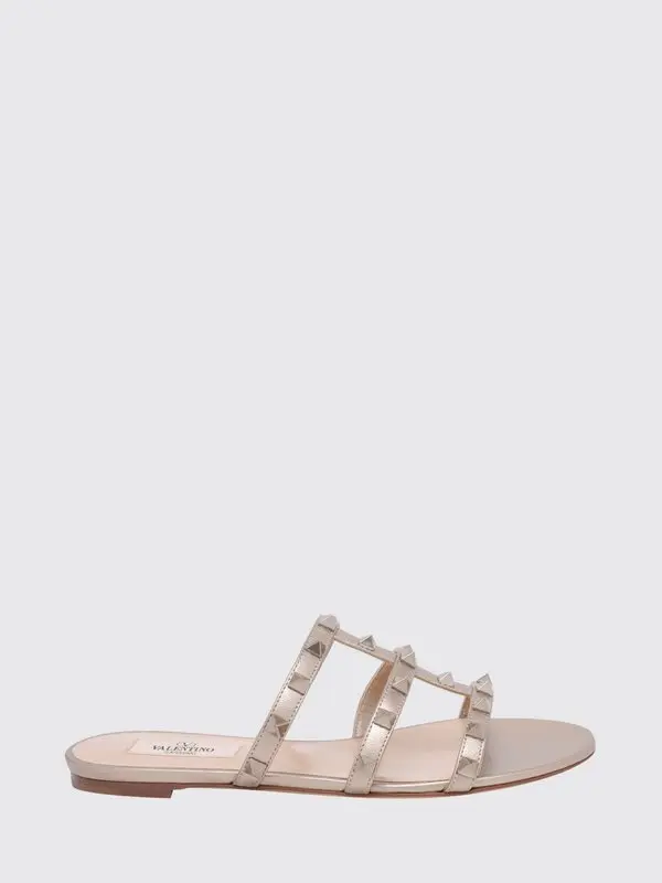 Valentino Garavani Rockstud Flat Sandals In Laminated Leather With Studs