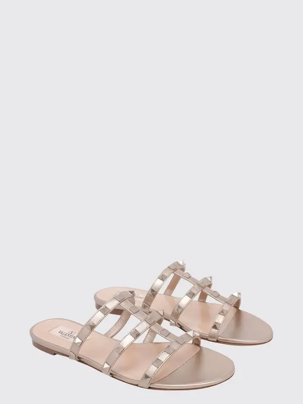 Valentino Garavani Rockstud Flat Sandals In Laminated Leather With Studs