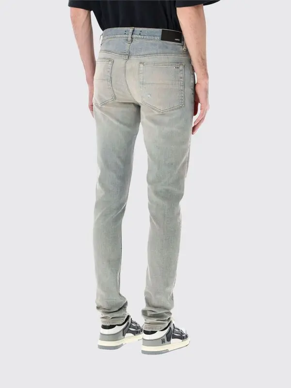 Amiri Distressed Light Wash Denim Jeans - Indigo