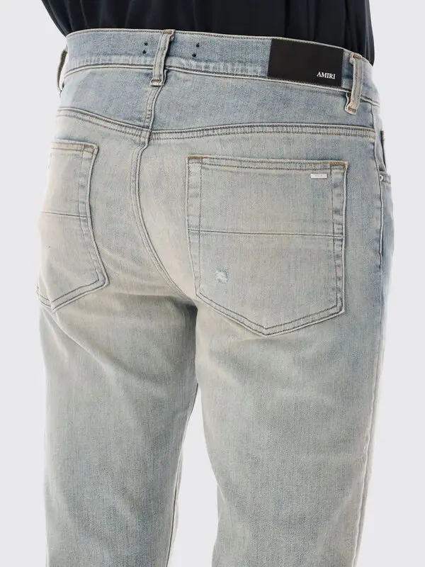 Amiri Distressed Light Wash Denim Jeans - Indigo