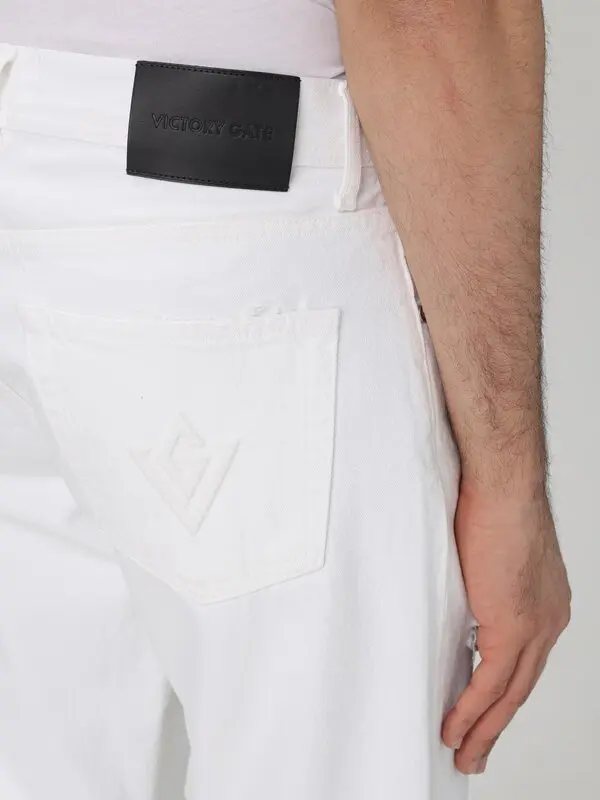 VICTORY GATE Jeans With Knee Slits And Raw Edge Hem