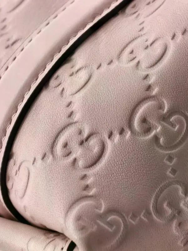 Gucci Gg Emblem Gg Embossed Leather Small Bucket Bag