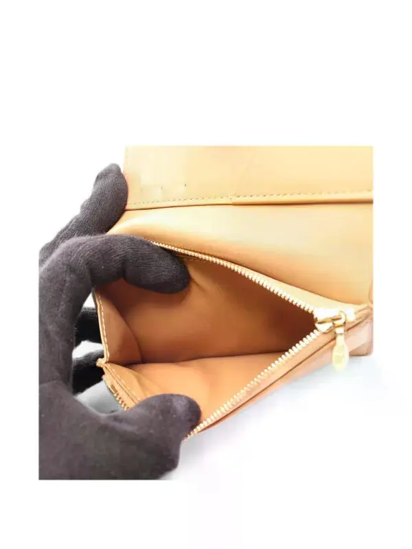 LOUIS VUITTON Vertical Bi-fold Wallet