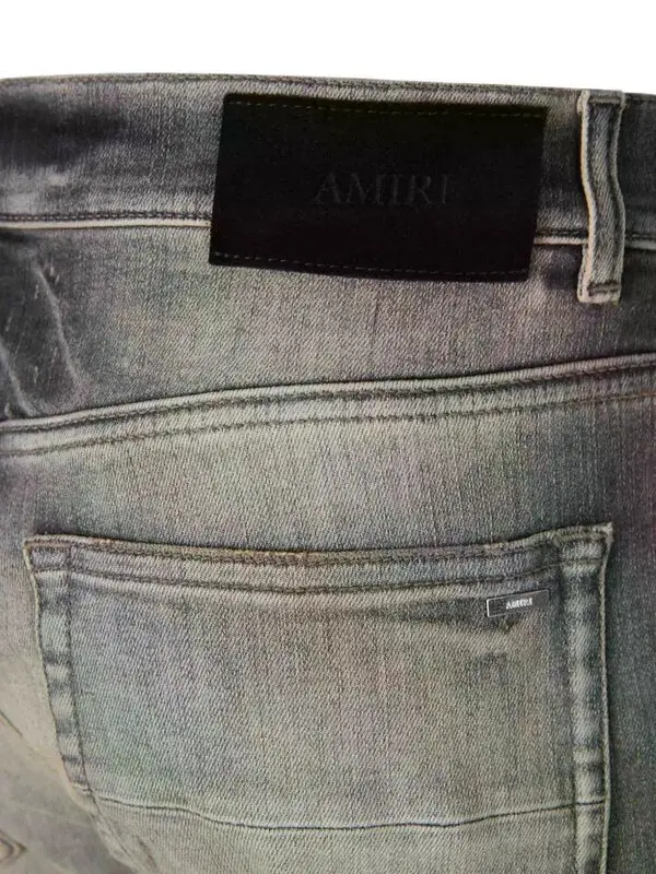 Amiri Distressed Checked-panel Jeans