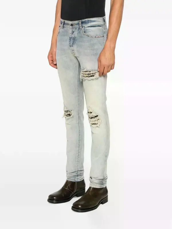 Amiri Stud-embellished Distressed Jeans