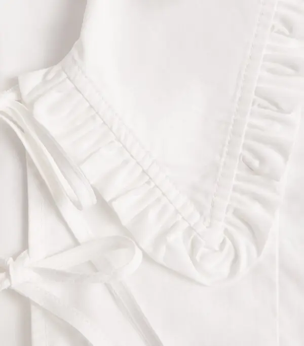 GANNI Cotton Peplum Blouse With Bow Detail And Ruffled Collar