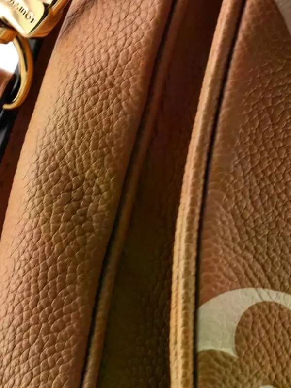 LOUIS VUITTON Pochette Metis Monogram Empreinte Giant Crossbody Bag