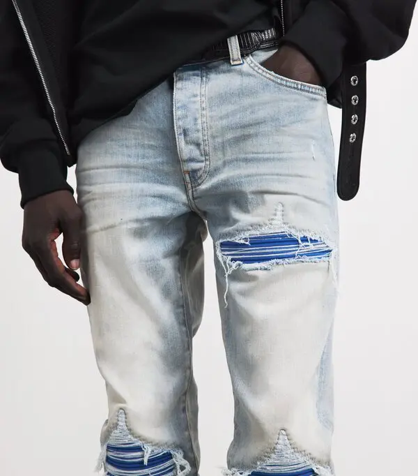 Amiri Ripped Ultrasuede Skinny Jeans