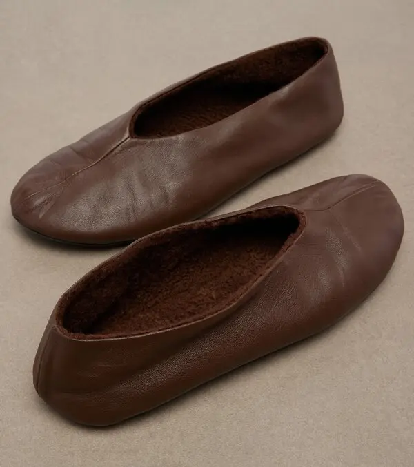 THE ROW Stella Shearling-trimmed Leather Ballet Flats