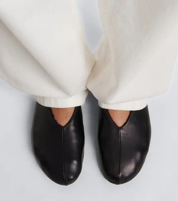 THE ROW Stella Shearling-trimmed Leather Ballet Flats