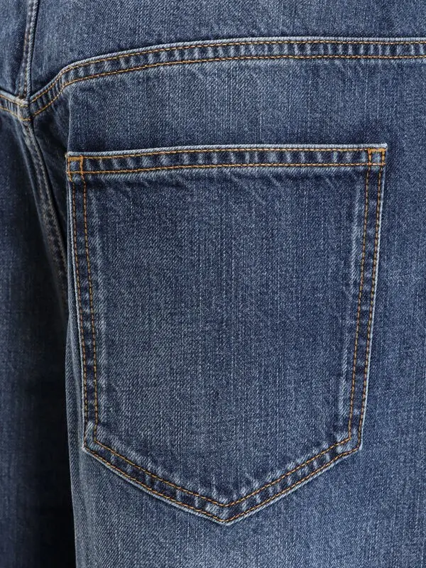 Givenchy Twisted Stone-washed Denim Jeans