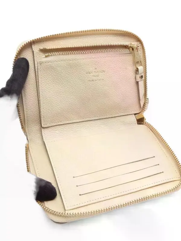 LOUIS VUITTON 2012 Zippy Monogram Empreinte Wallet
