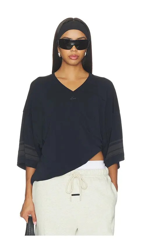 NIKESKIMS Stretch Knit V- Neck Top In . Also