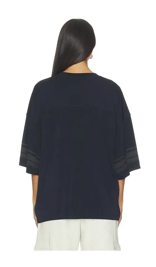 NIKESKIMS Stretch Knit V- Neck Top In . Also
