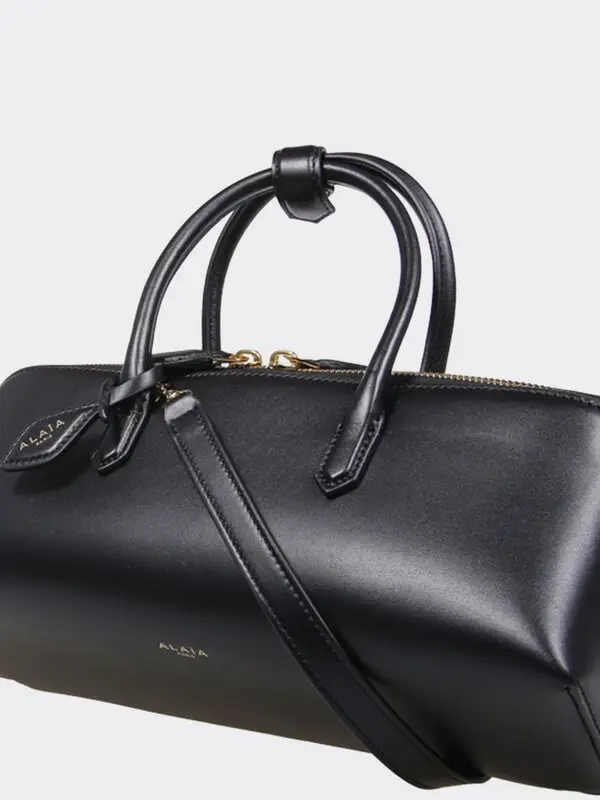 Alaïa Small Leather Handbag With Tubular Handle And Logo Charm - Black