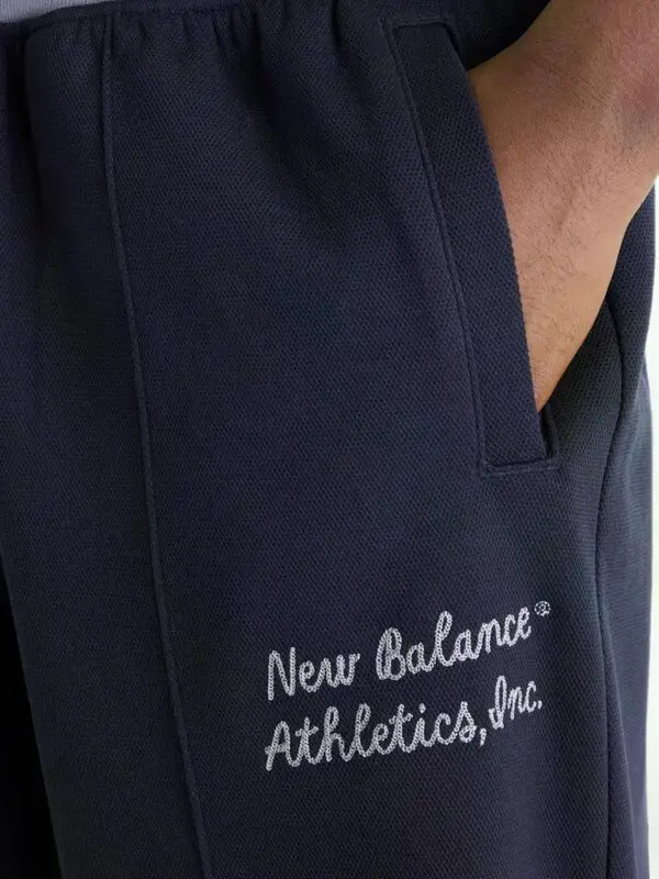 NEW BALANCE Sport Legacy Pique Pleated Relaxed Fit Trousers