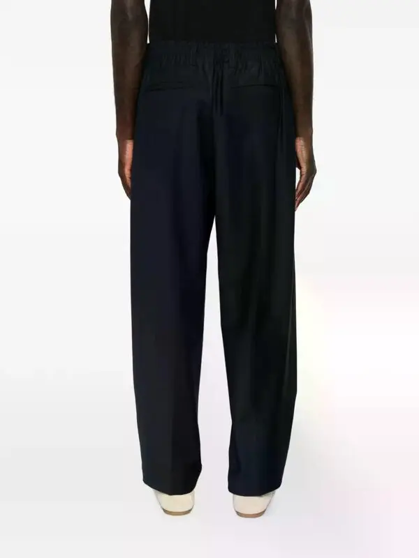 MYTHS Pleated Front Wide Leg Trousers