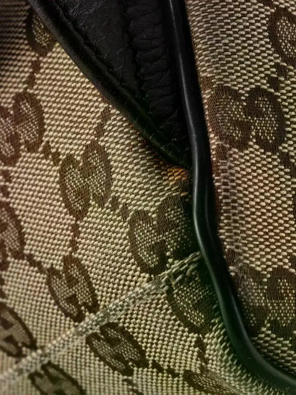 Gucci Zip Around Travel Gg Canvas Backpack