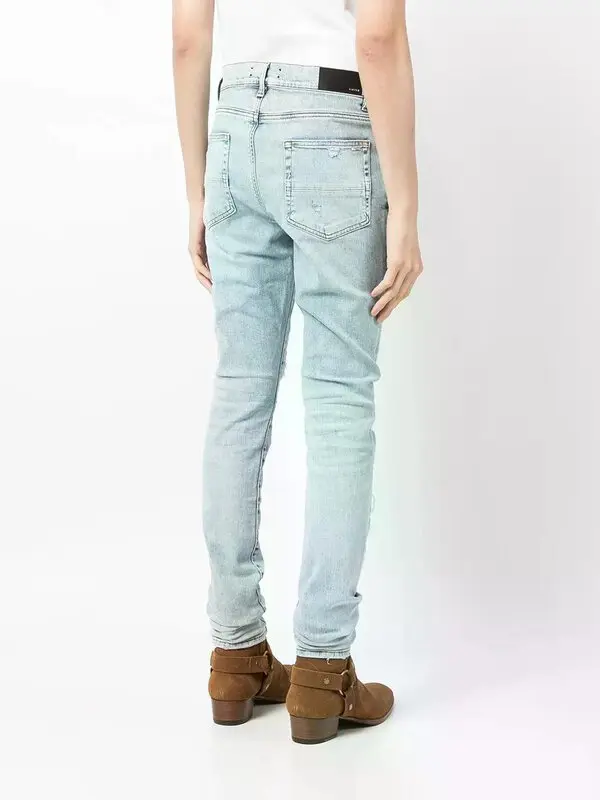 Amiri Distressed Skinny Jeans