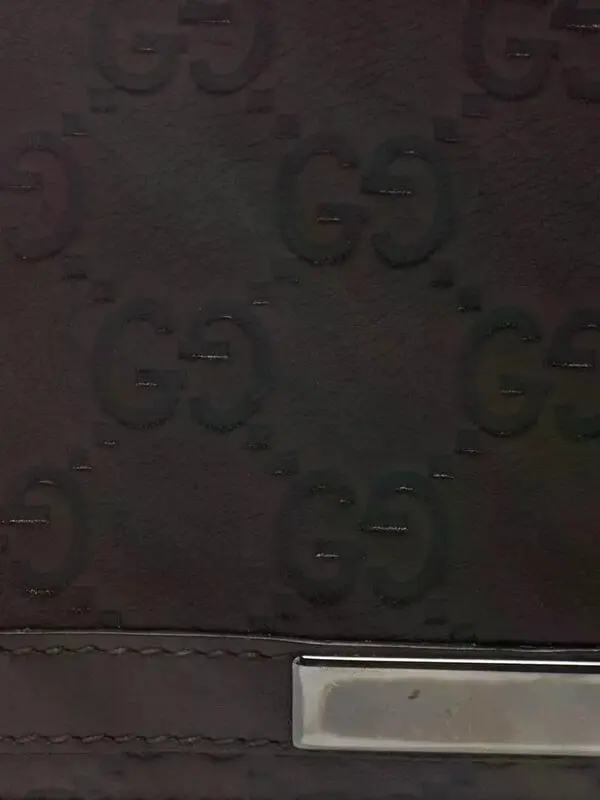 Gucci Guccissima Metal-bar Bifold Wallet