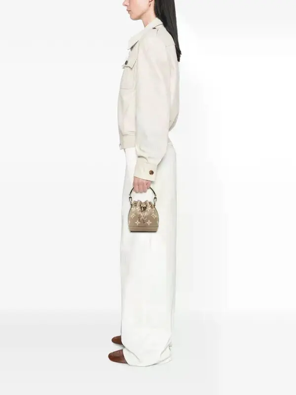 LOUIS VUITTON 2000-2026 Bicolor Monogram Empreinte Nano Noe Bucket Bag