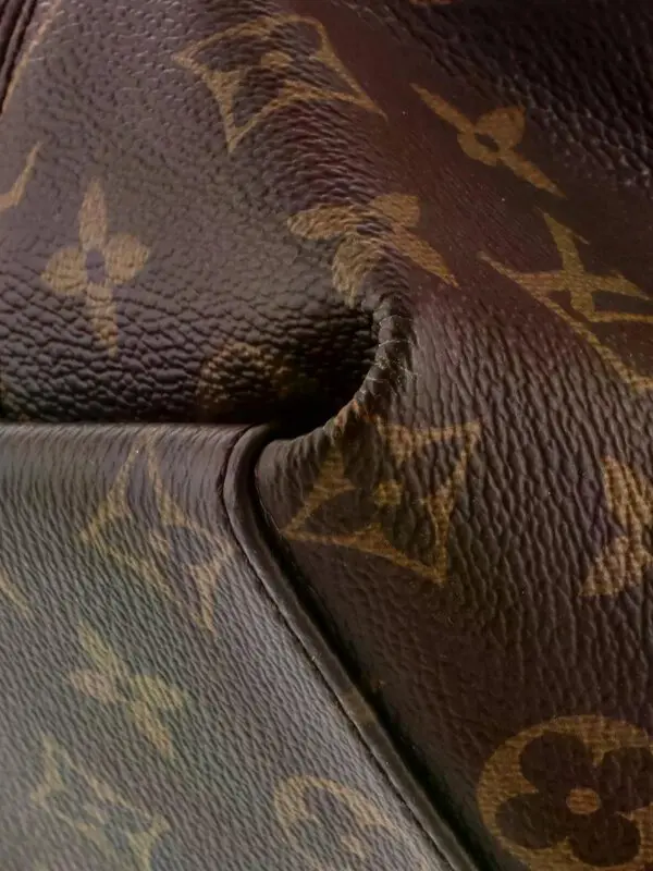LOUIS VUITTON Tuileries Monogram Canvas With Leather Hobo Bag