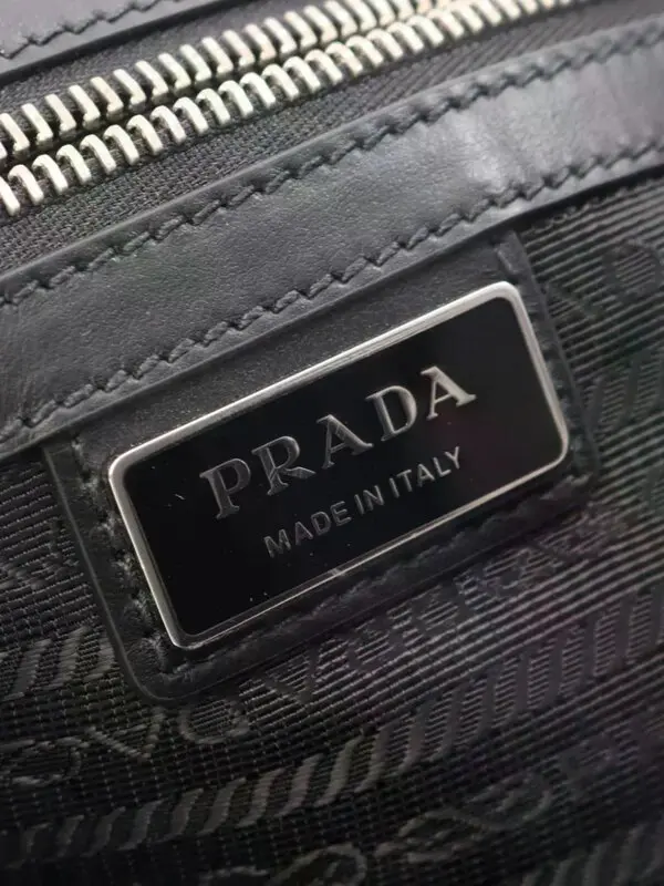 Prada 2013-2026 Vitello Daino Triangle Crossbody Bag