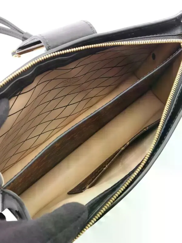 LOUIS VUITTON 2018-2026 Monogram Reverse Trunk Clutch Crossbody Bag