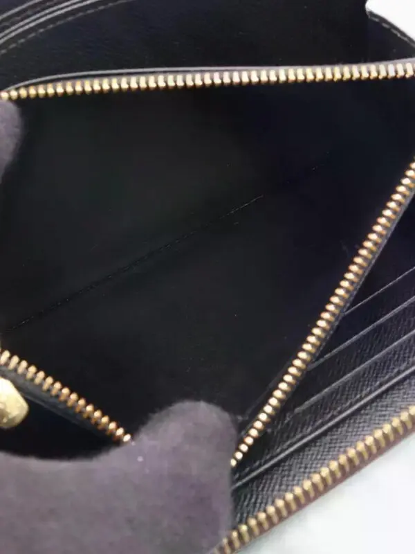 LOUIS VUITTON 2021s Zippy Monogram Giant Reverse Wallet
