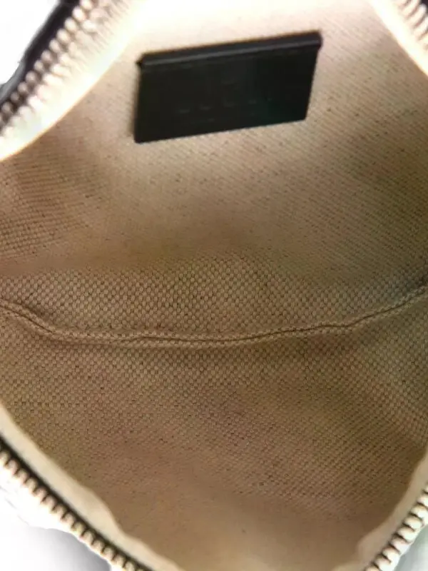 Gucci Gg Embossed Perforated Leather Small Belt Bag