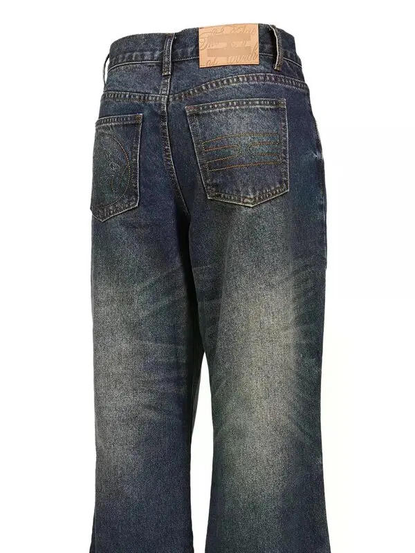 THE EDGE OF EARTH™ Bleached-effect Flared Jeans