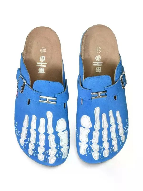 THE EDGE OF EARTH™ X Octavious Marks Skeleton-patch Buckle-strap Mules