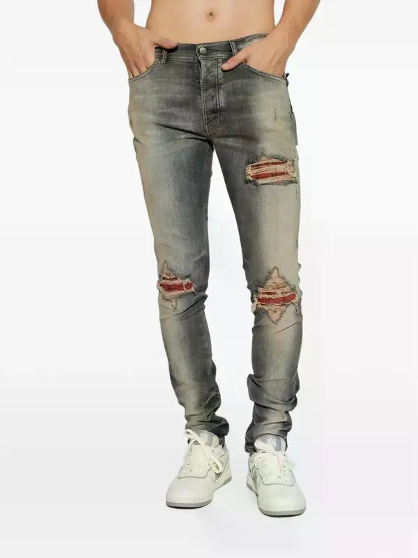 Amiri Distressed Patchwork Jeans