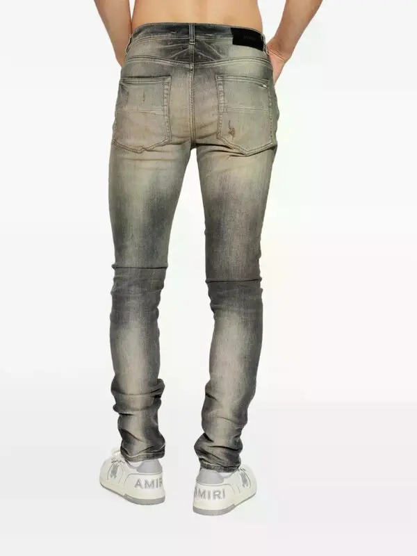 Amiri Distressed Patchwork Jeans