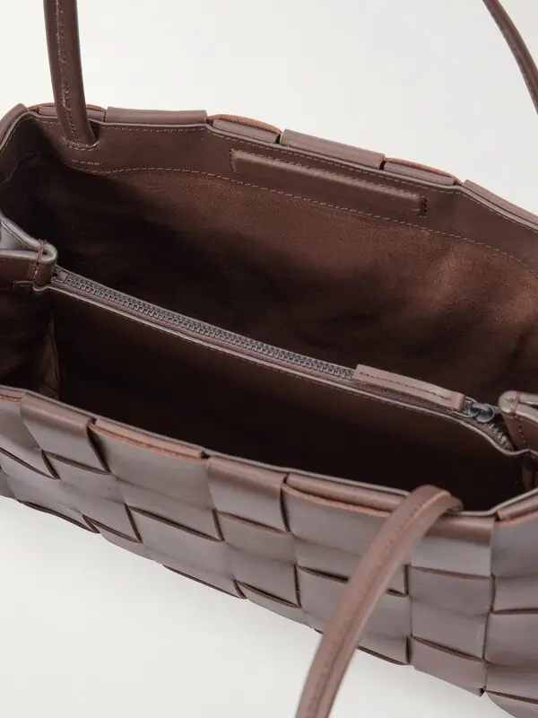 ST. AGNI Woven Leather Shoulder Bag