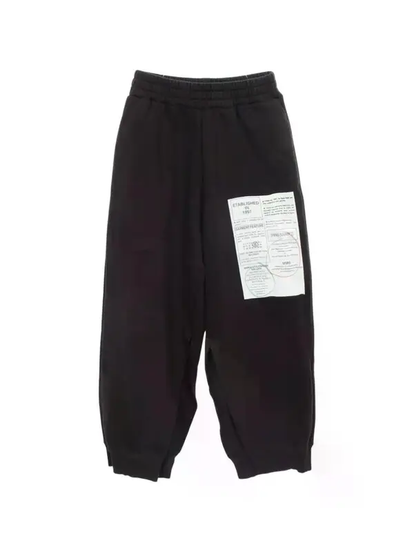 MAISON MARGIELA Newspaper Print Track Pants