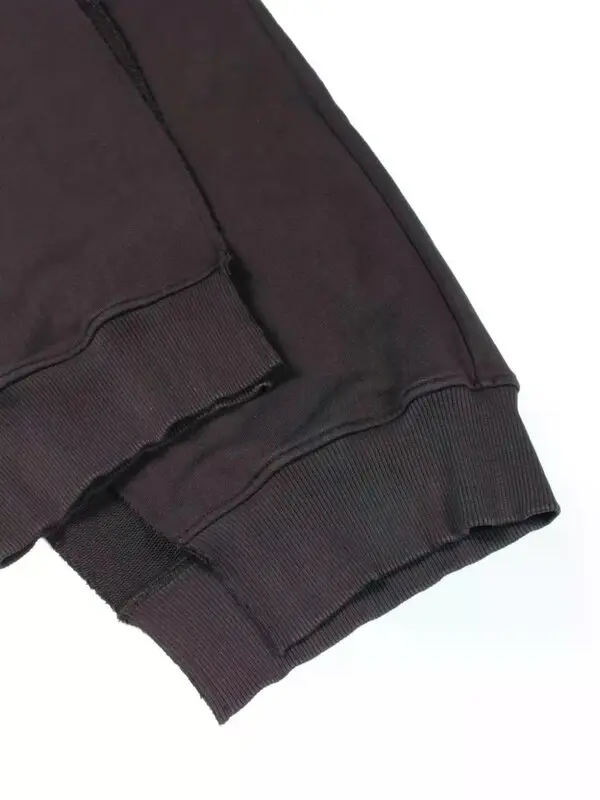 MAISON MARGIELA Newspaper Print Track Pants