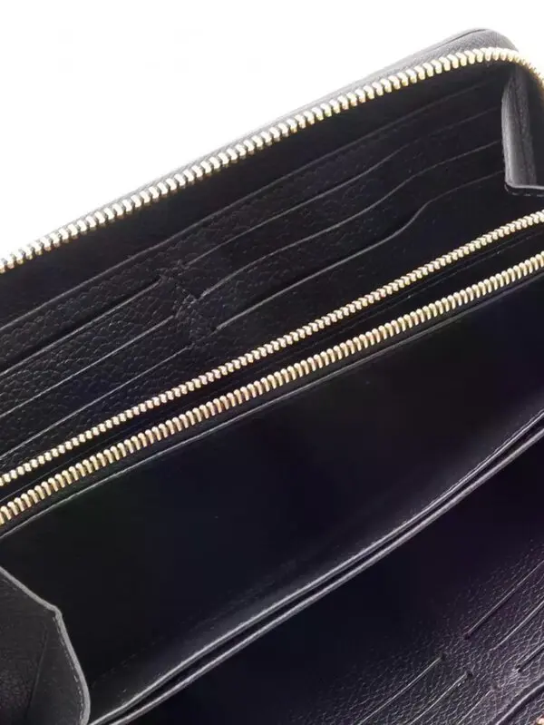 LOUIS VUITTON Zippy Leather Wallet