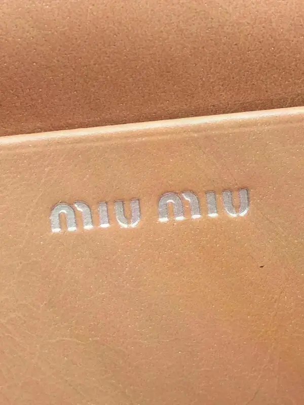 Miu Miu Logo-embossed Leather Clutch Bag