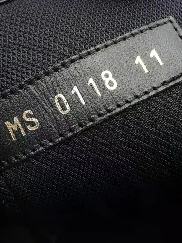 LOUIS VUITTON High Top Monogram Canvas Sneakers