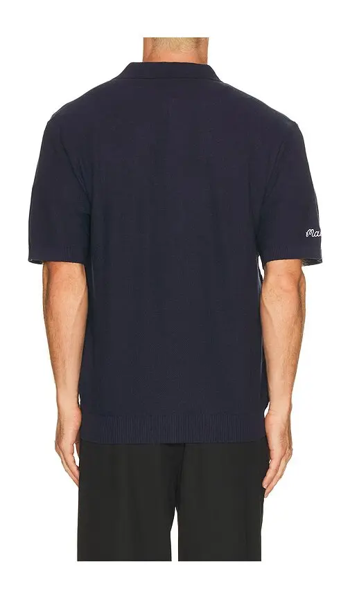 MALBON Crosscut Polo In . Also